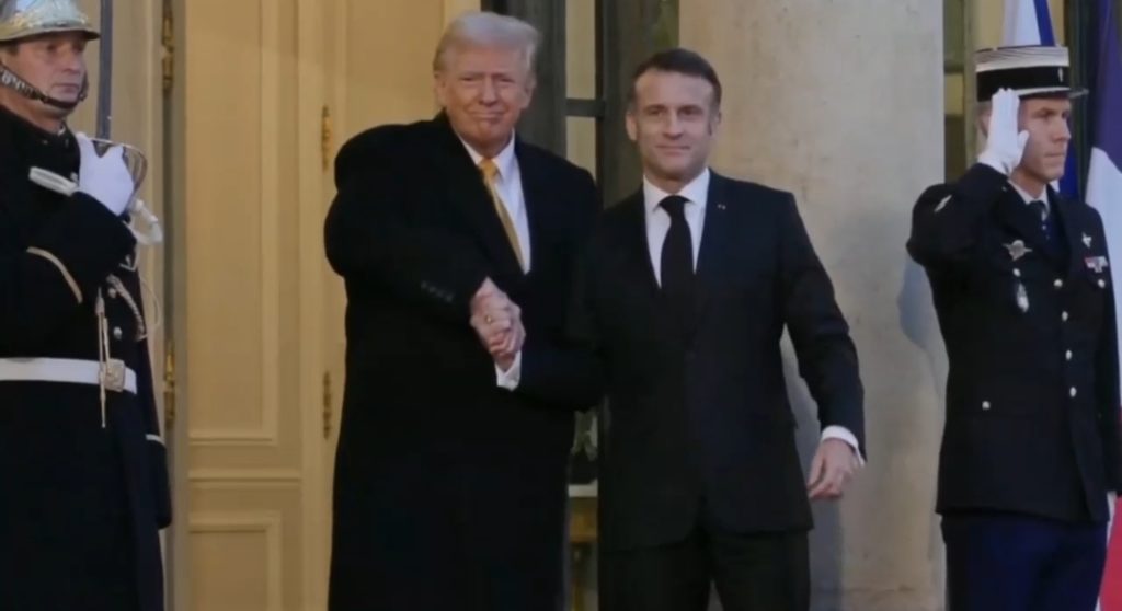 Donald Trump's strange handshake with French President Emmanuel Macron ...